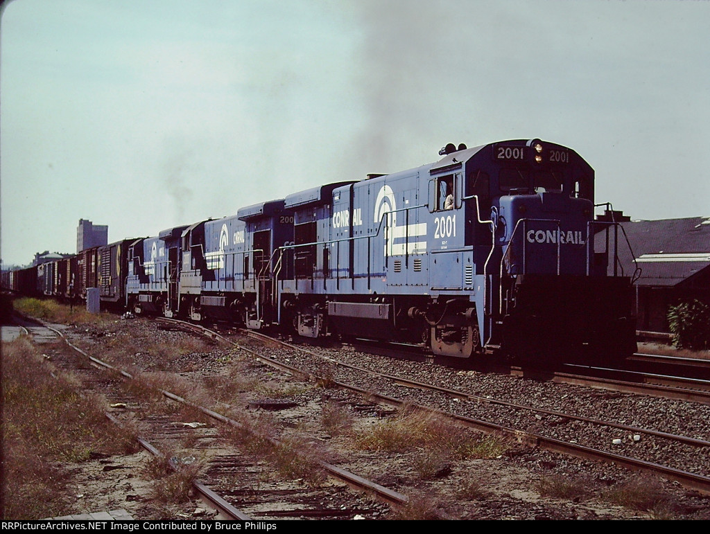Conrail Eastbound passes Armoury Branch switch by old freight house